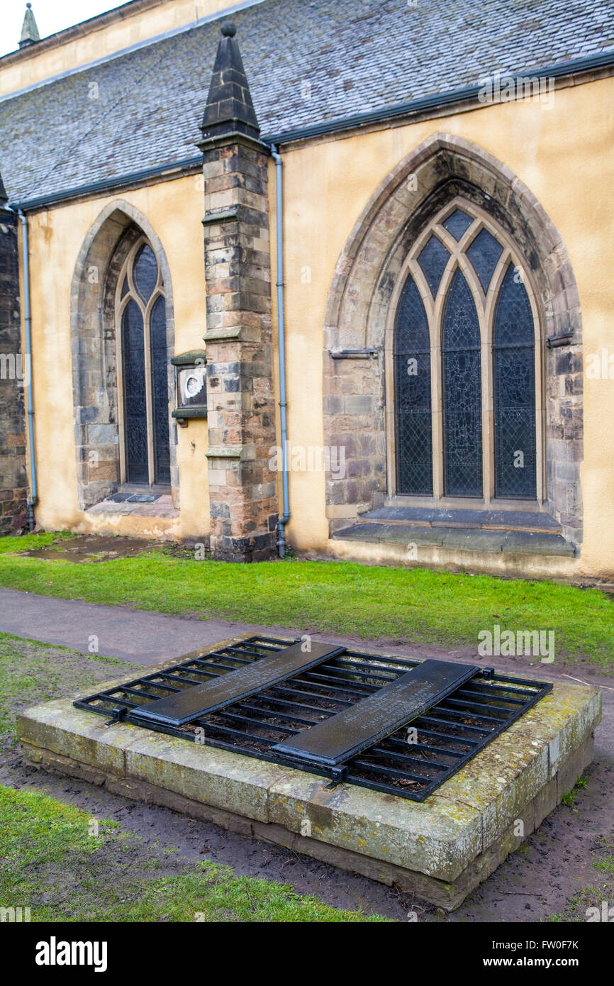 An iron cage (known as a mortsafe) covering a grave in Greyfriars ...