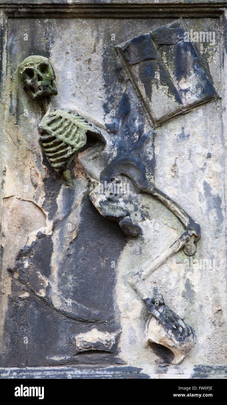 EDINBURGH, SCOTLAND - MARCH 11TH 2016: A dancing skeleton carrying a ...