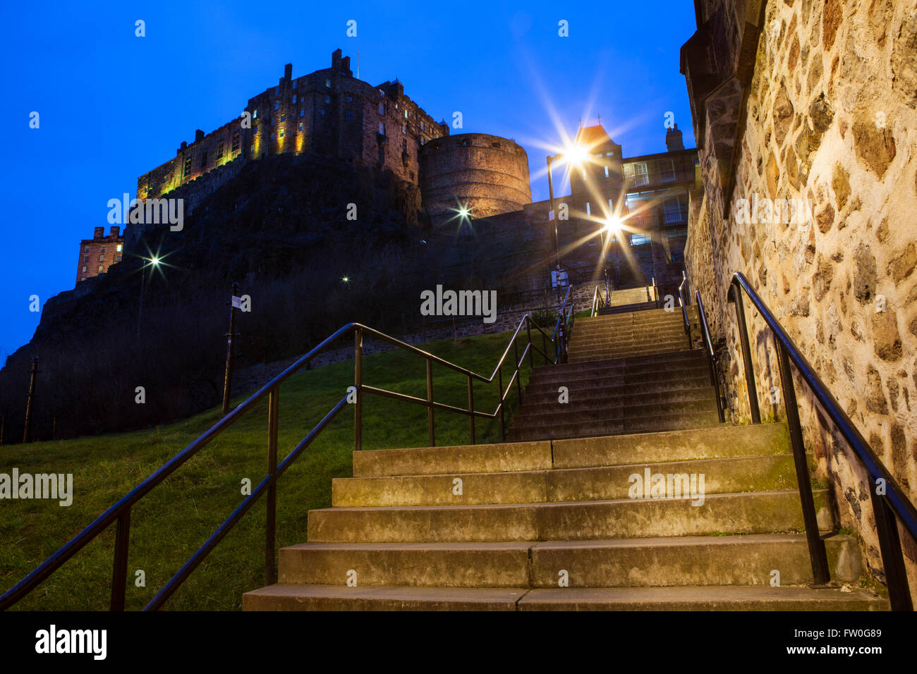 A dusk-time view of Edinburgh Castle and Grannys Green Steps in ...