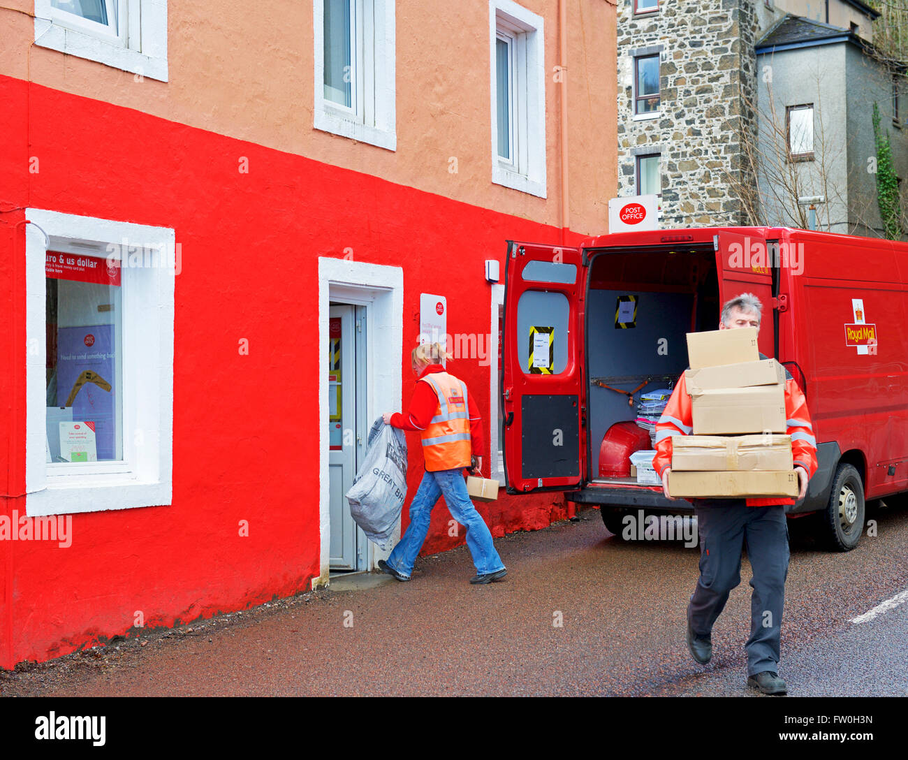 Postman, postwoman, royal mail van and post office, Tobermory, Isle of ...