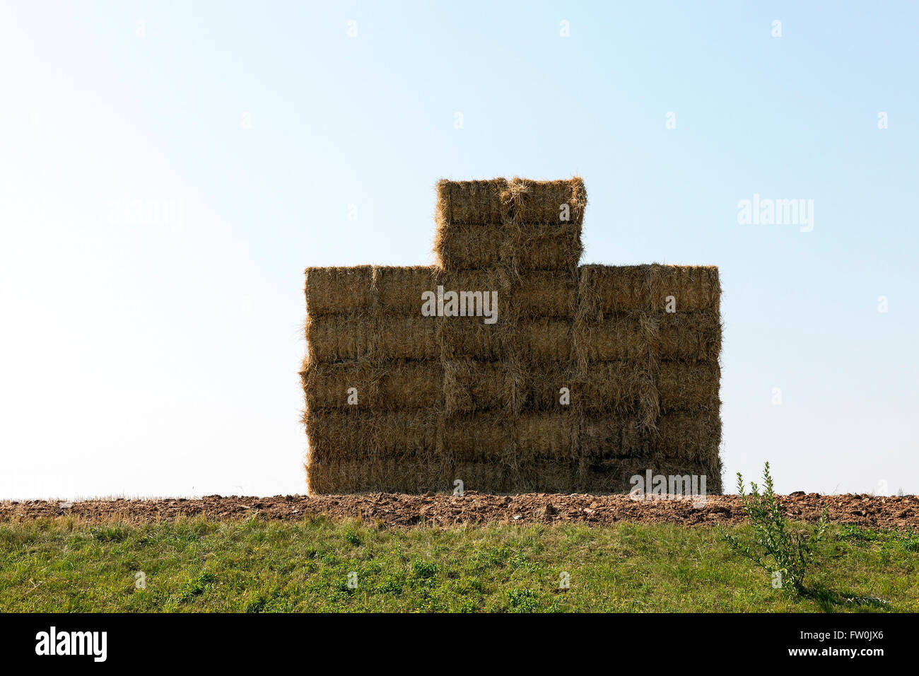 Stack of straw, wheat Stock Photo - Alamy