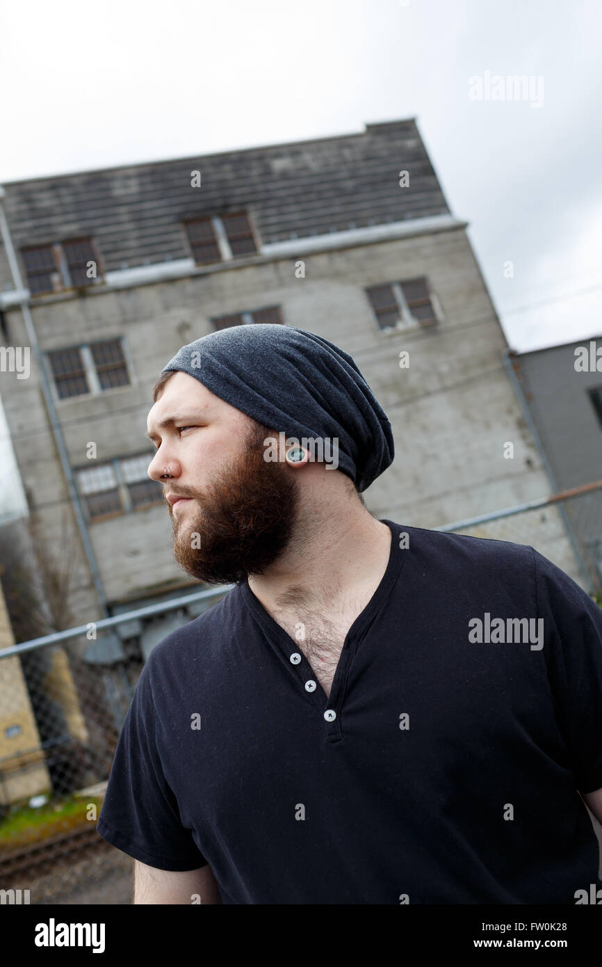 Young adult man outdoors in an urban environment for a lifestyle ...