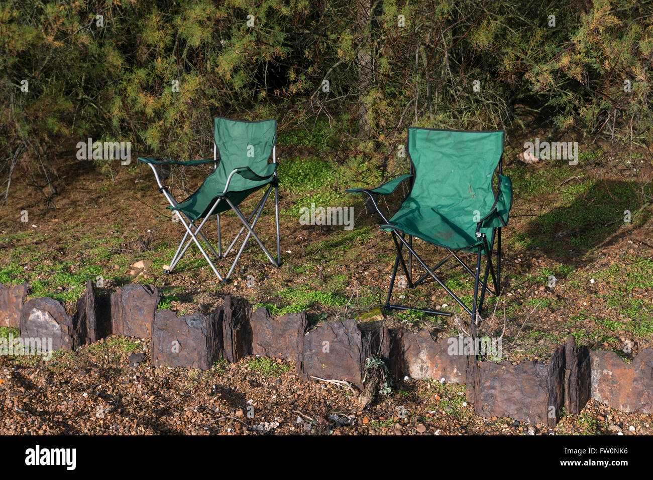 Abandoned plastic portable chairs Stock Photo - Alamy
