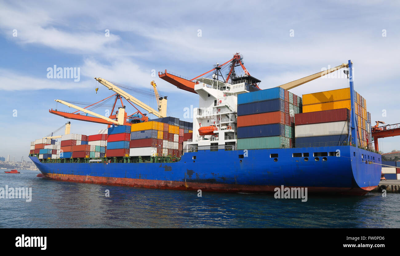 Container Ship is loading in a port Stock Photo - Alamy