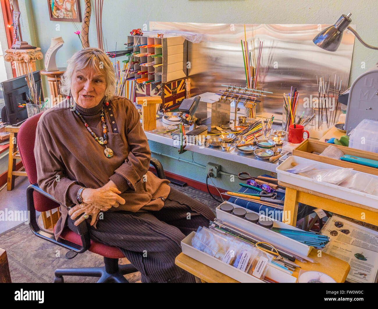 Kate Drew-Wilkinson, a well known art glass artist, works in her studio ...