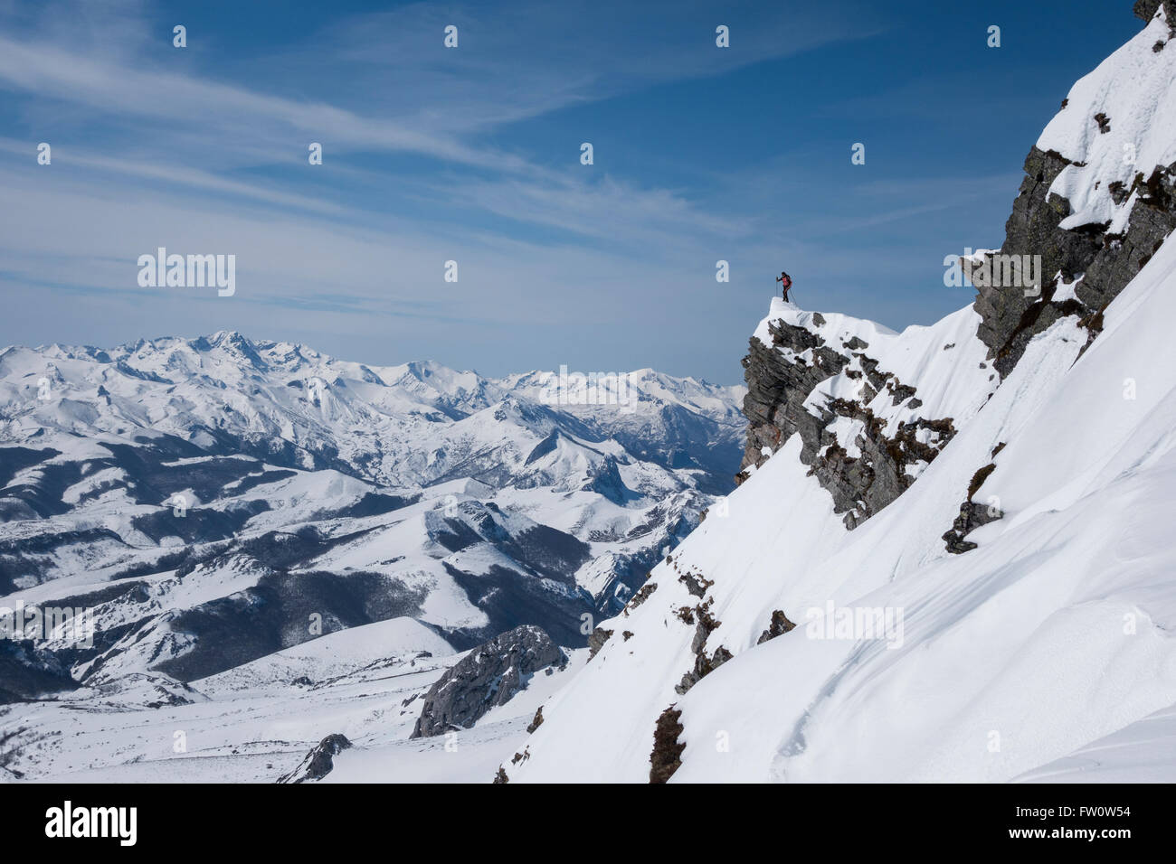 CLIMBER OVER A CLIFF SEEING THE HORIZON AND THE LANDSCAPE Stock Photo ...