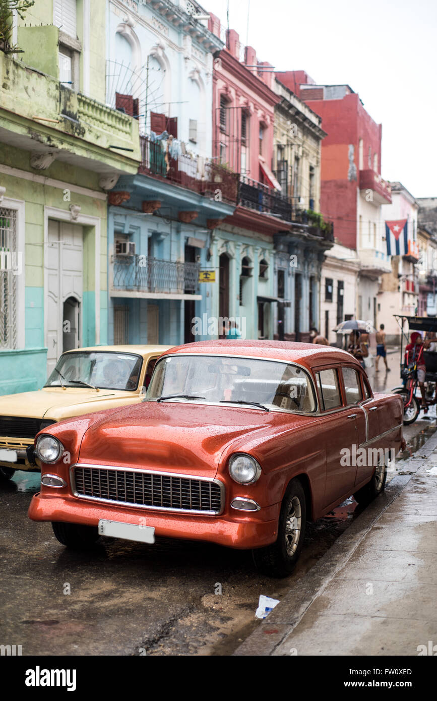 Street scene with old car on rainy day in Havana,Cuba Stock Photo - Alamy