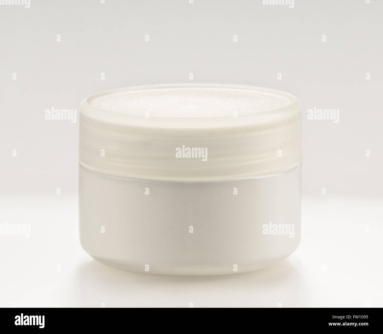 Clean white plastic cream pot for skin, face or other body care recipe ...