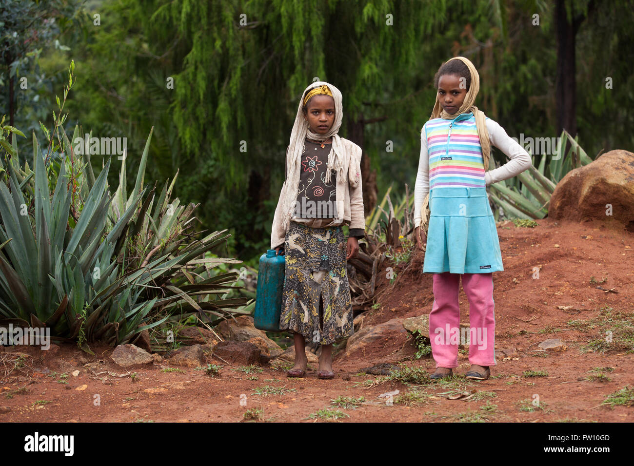 African children fetch water hi-res stock photography and images - Alamy