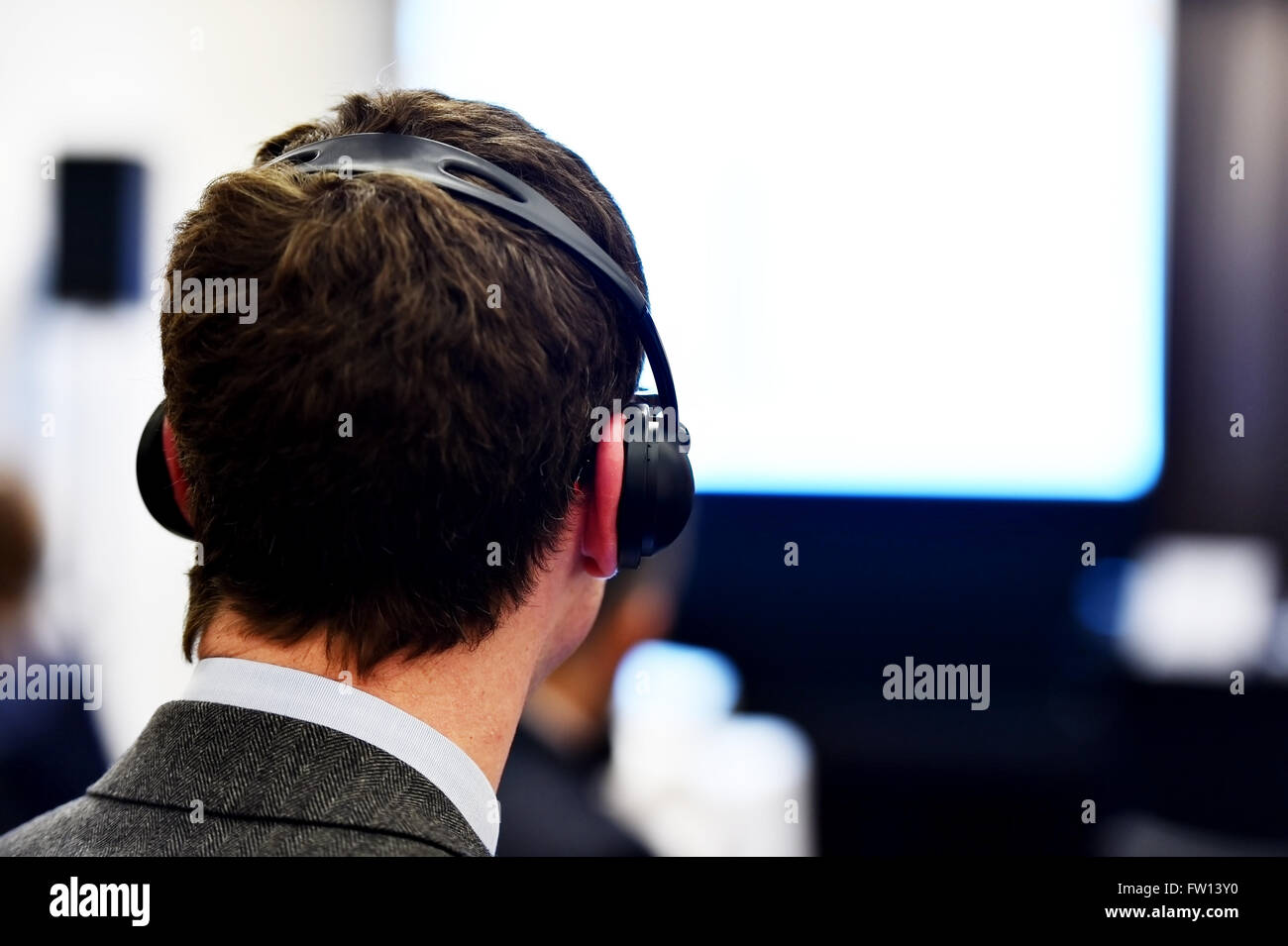 Black business woman using headphone hi-res stock photography and ...