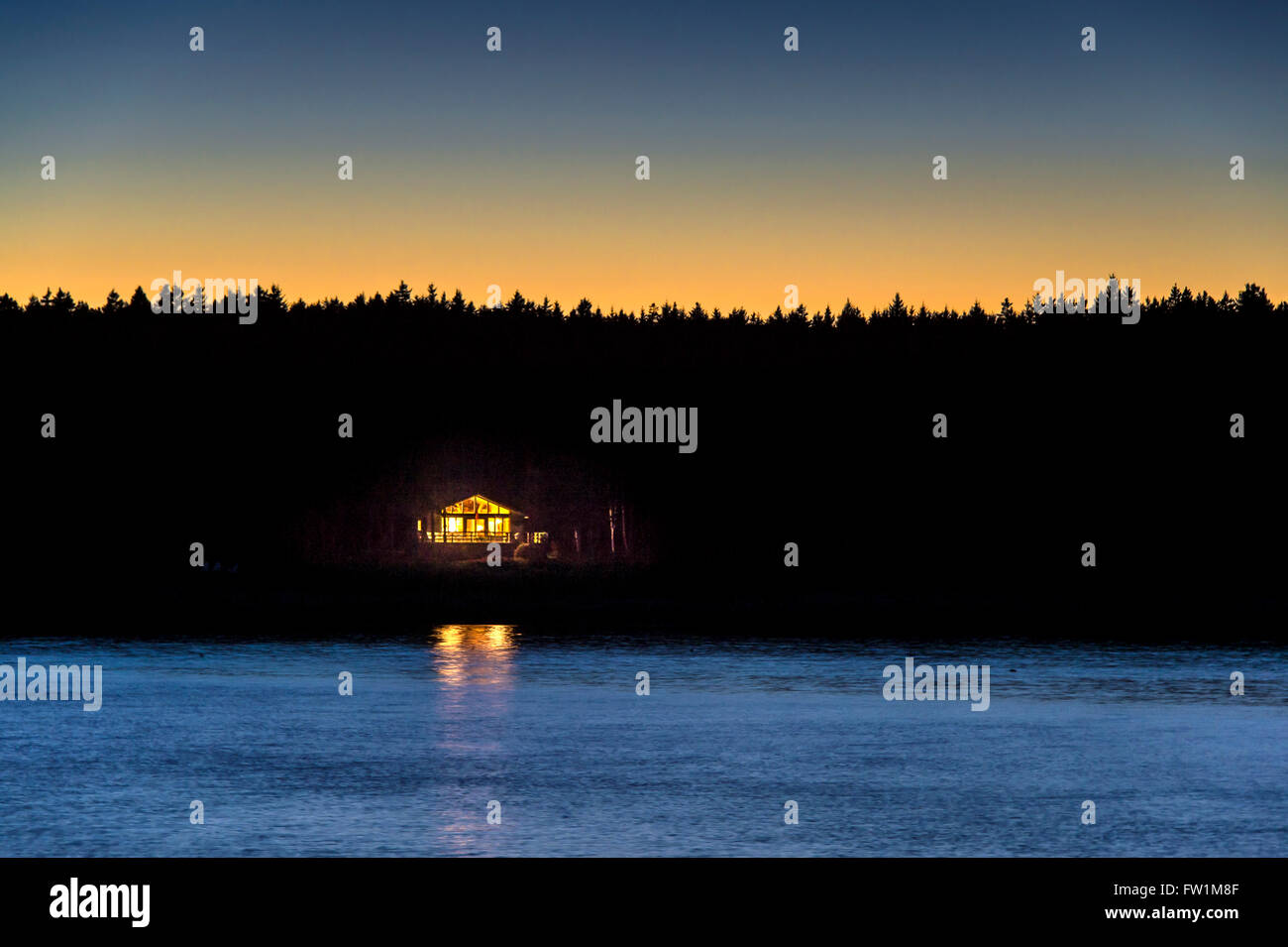 Small waterfront cabin in a remote secluded location Stock Photo - Alamy