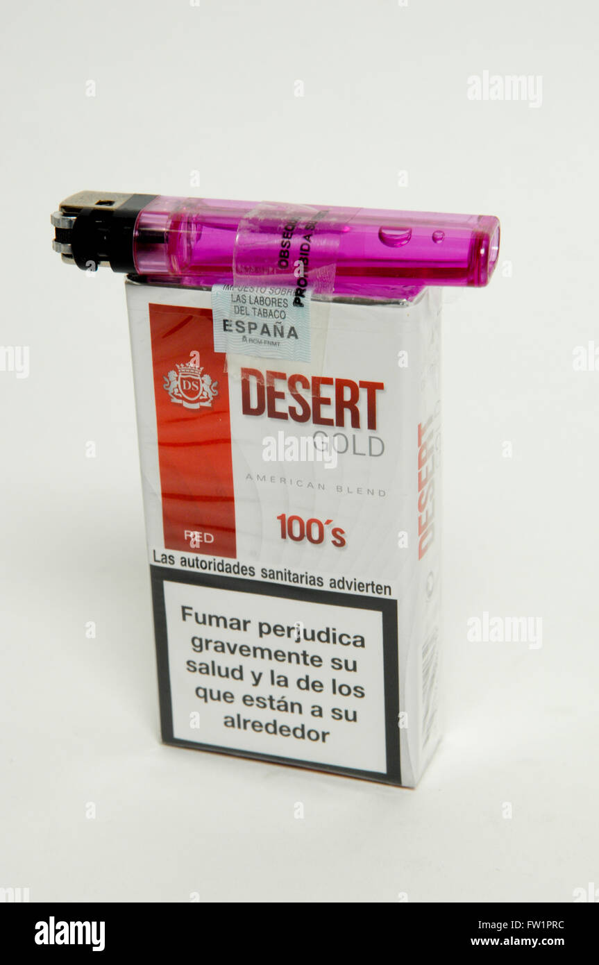 Desert Gold Red 100.s Cigarettes Tobacco and Lighter Stock Photo - Alamy