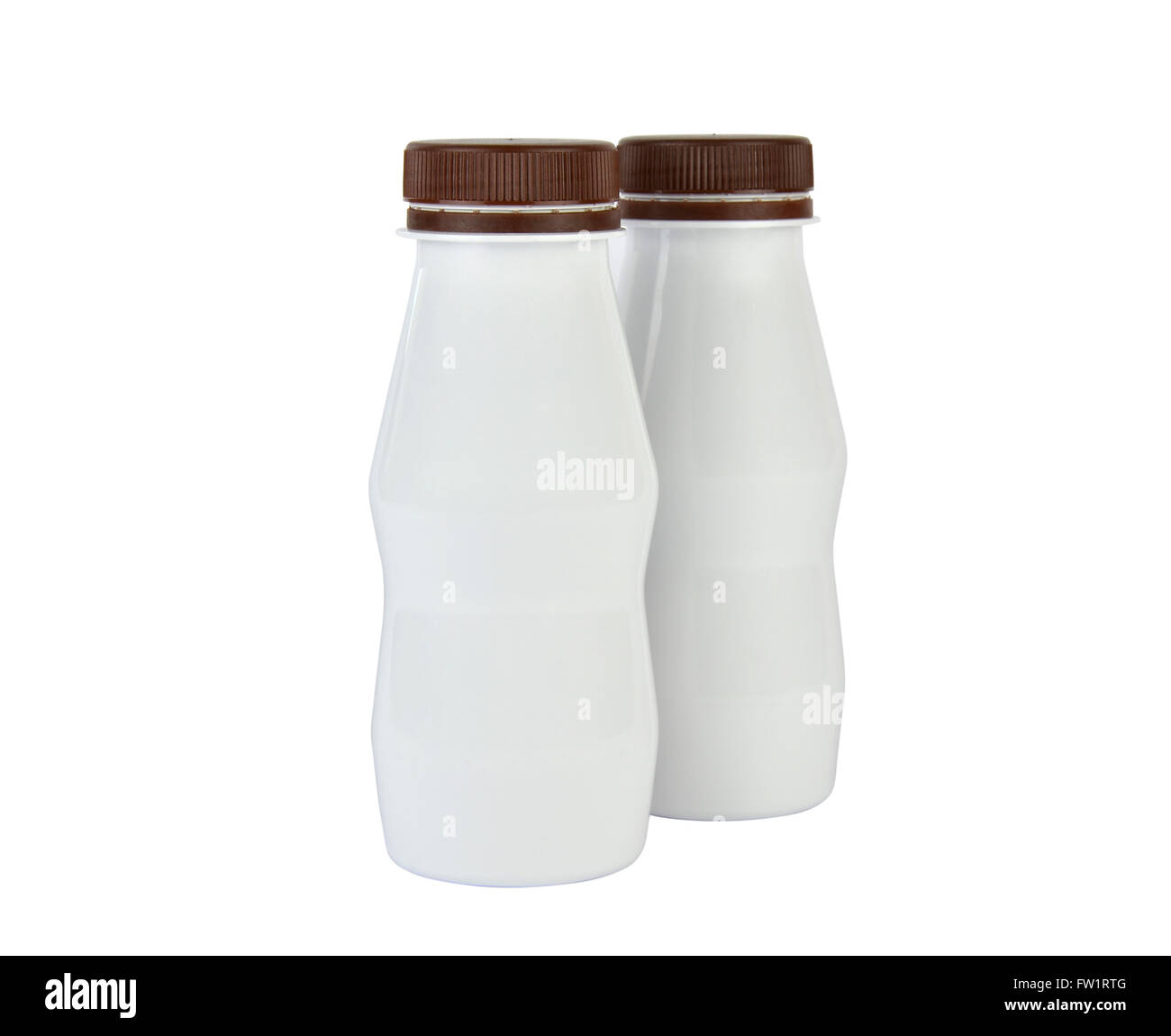 Two closed white plastic bottles with brown caps on white background ...