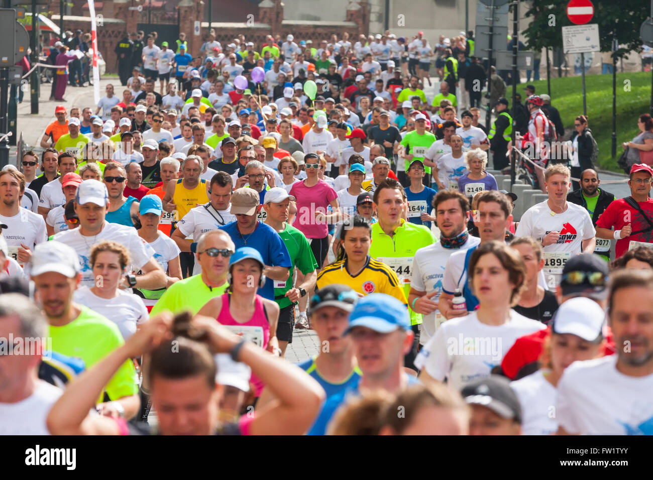 KRAKOW, POLAND - MAY 18 : Cracovia Marathon. Runners on the city ...