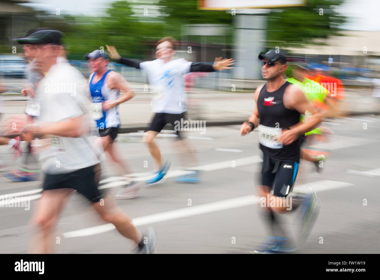 KRAKOW, POLAND - MAY 18 : Cracovia Marathon. Runners on the city ...