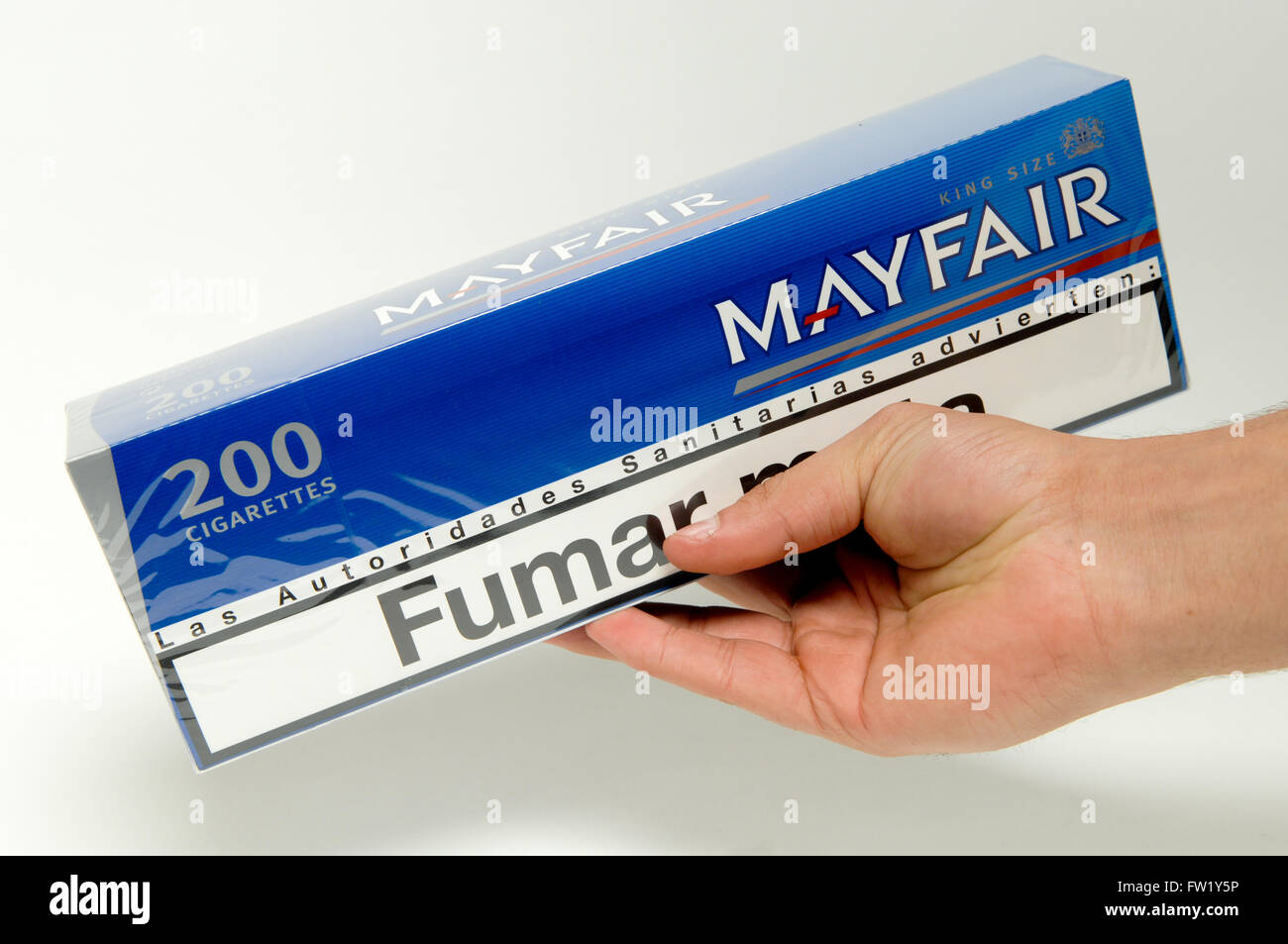 Carton of Mayfair Cigarettes being held by a hand Stock Photo - Alamy