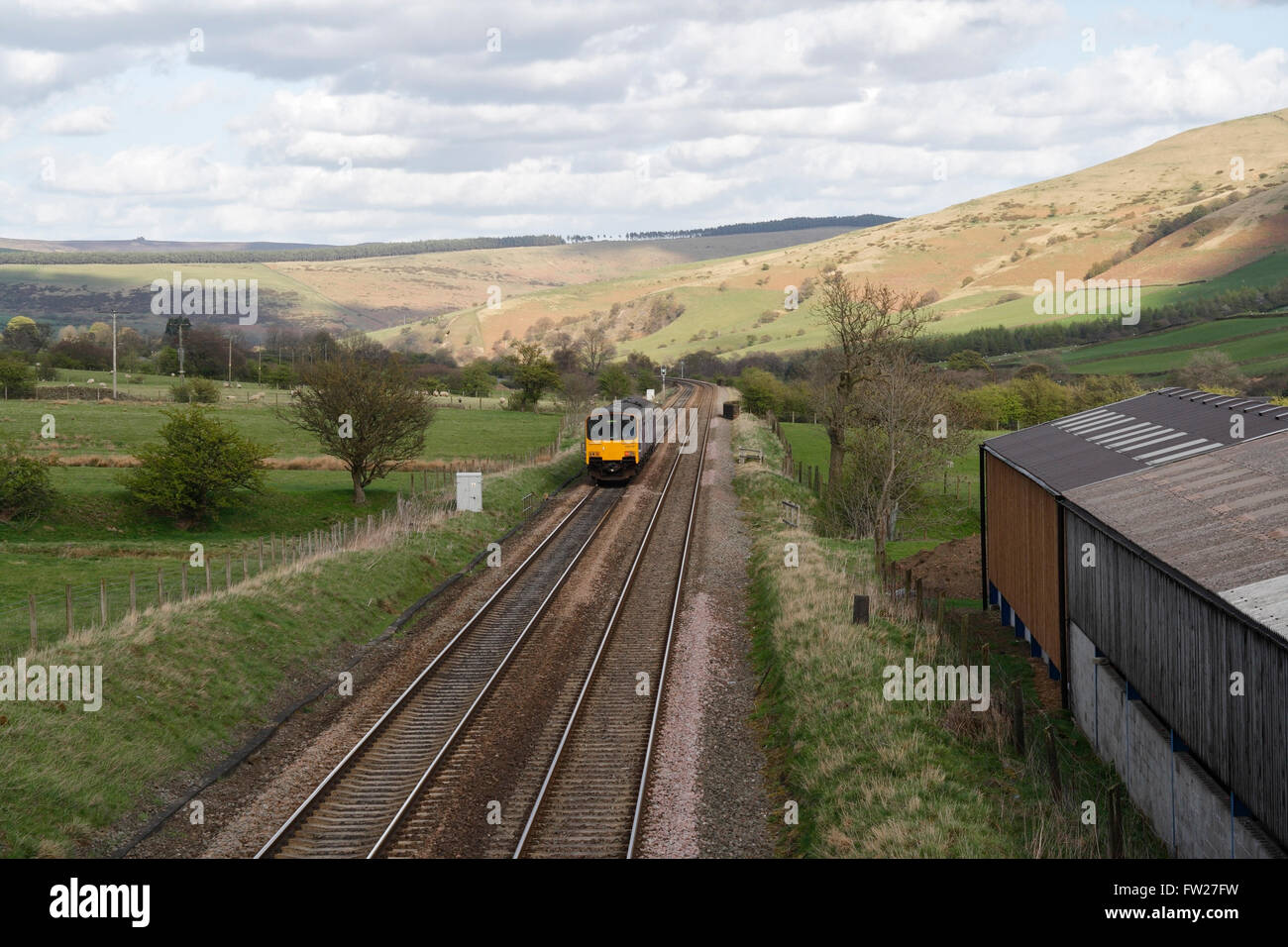 Passenger train at Edale on the Hope Valley line in Derbyshire Peak ...