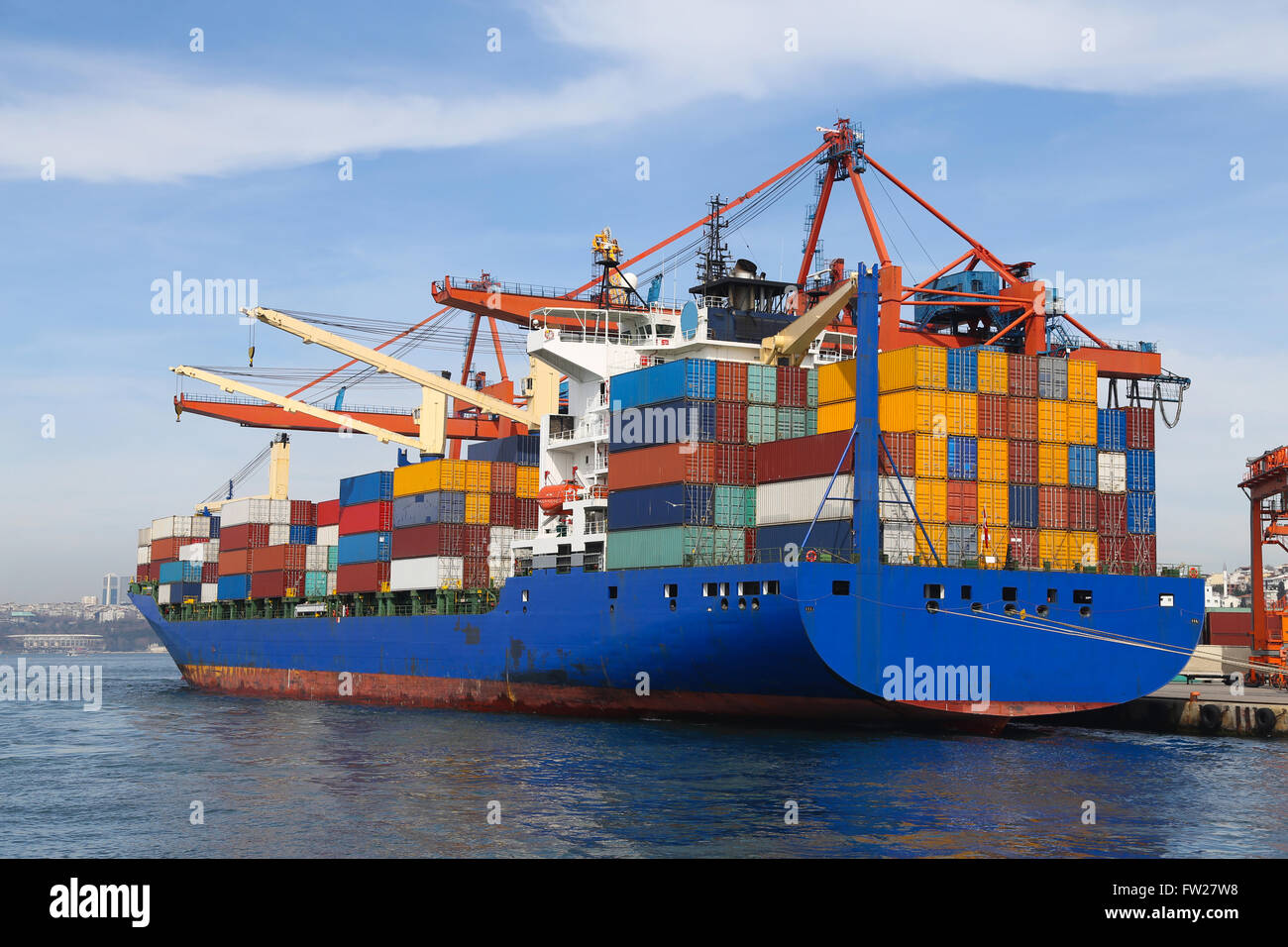 Container Ship is loading in a port Stock Photo - Alamy