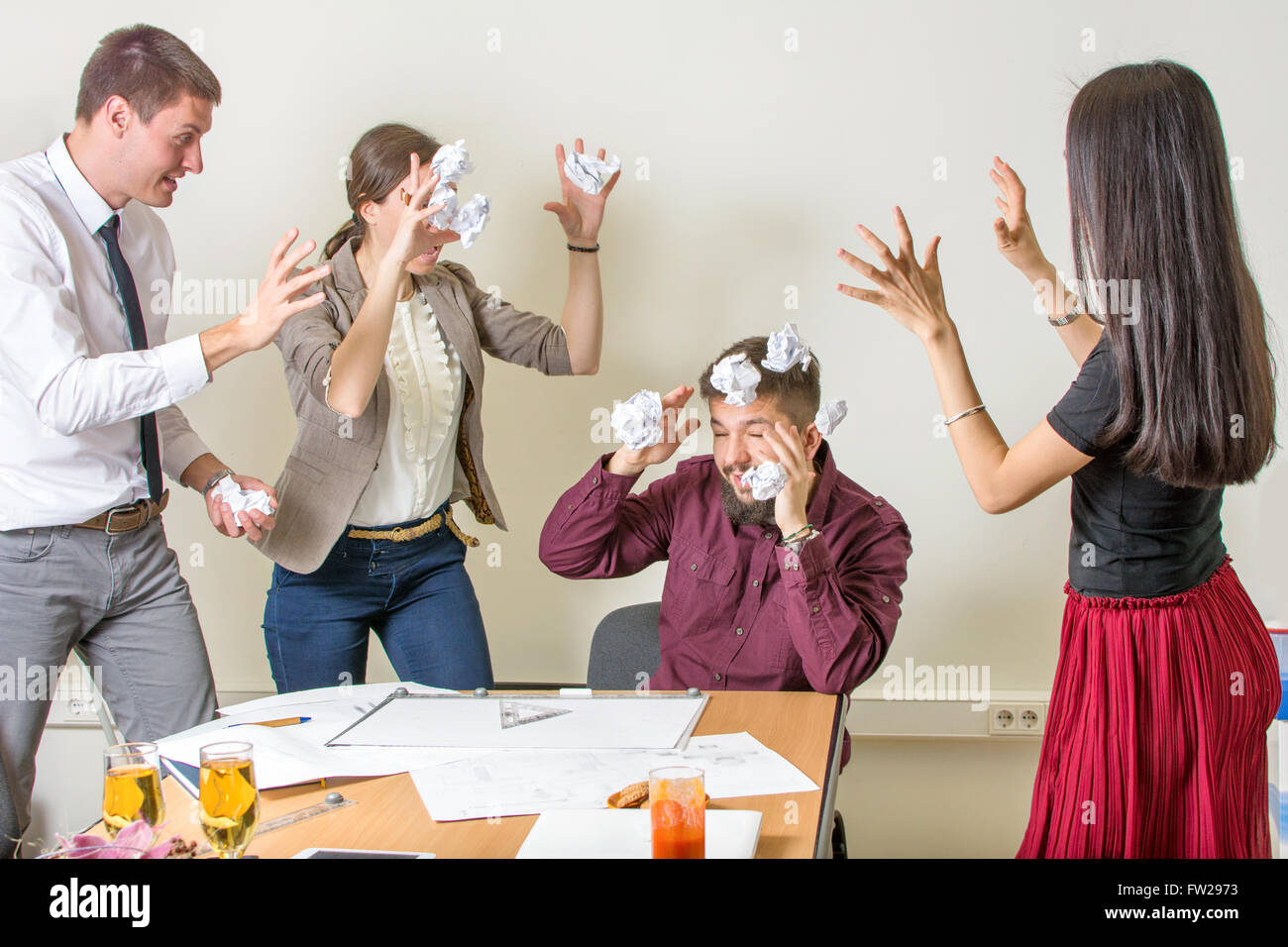 Woman throwing crumpled paper hi-res stock photography and images - Alamy