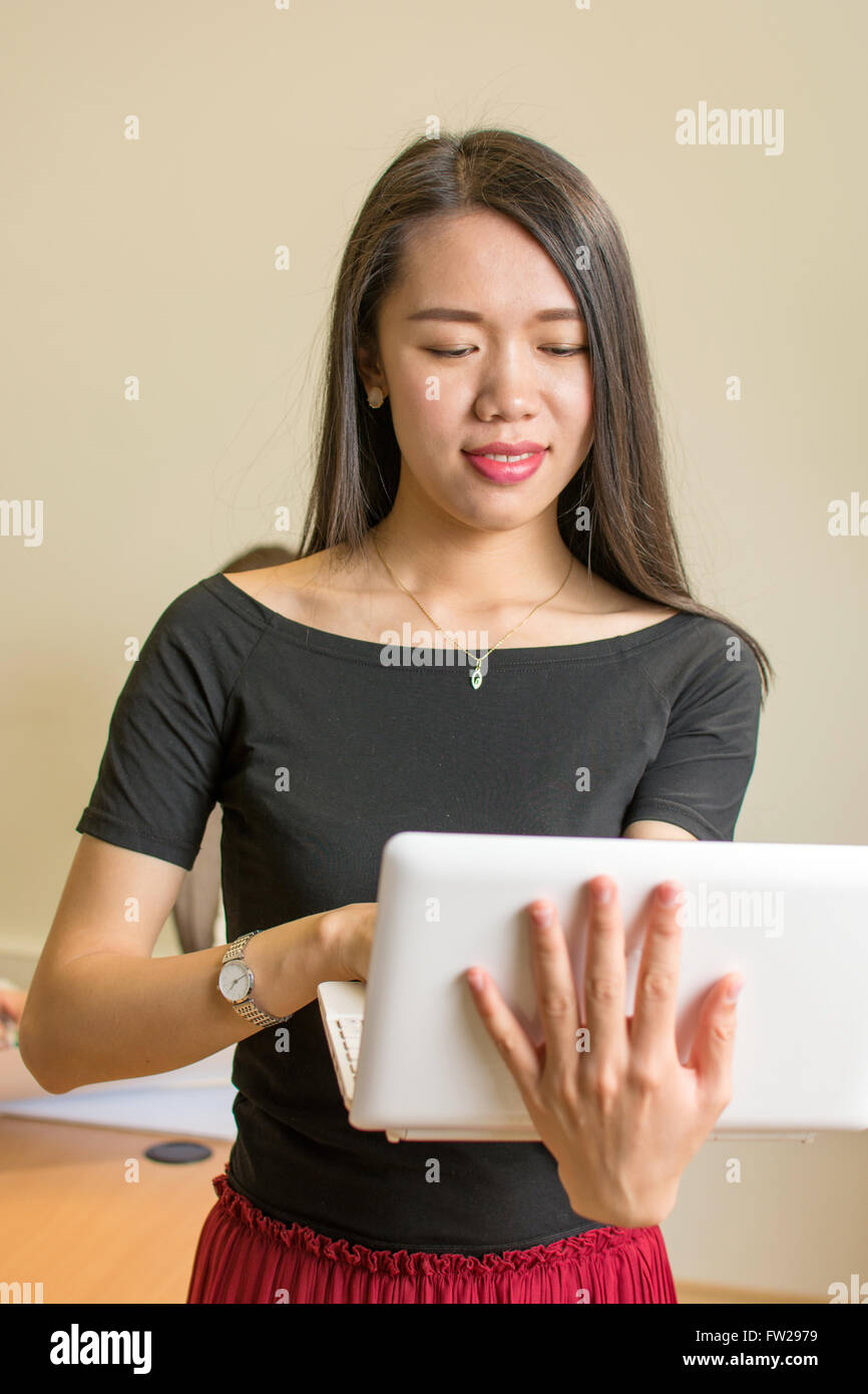 Confident asian woman leader at the office Stock Photo - Alamy