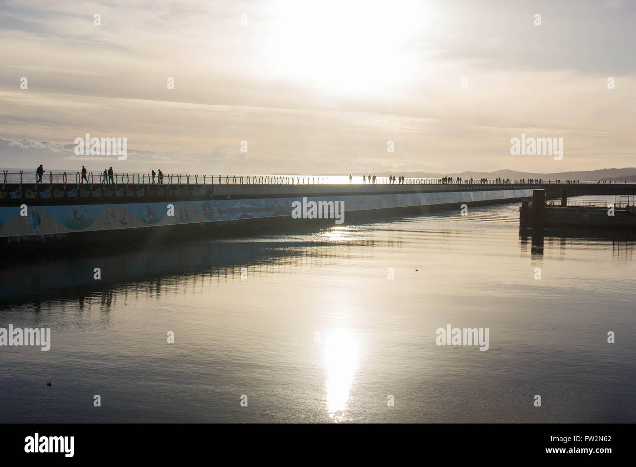 sunset at breakwater Stock Photo - Alamy