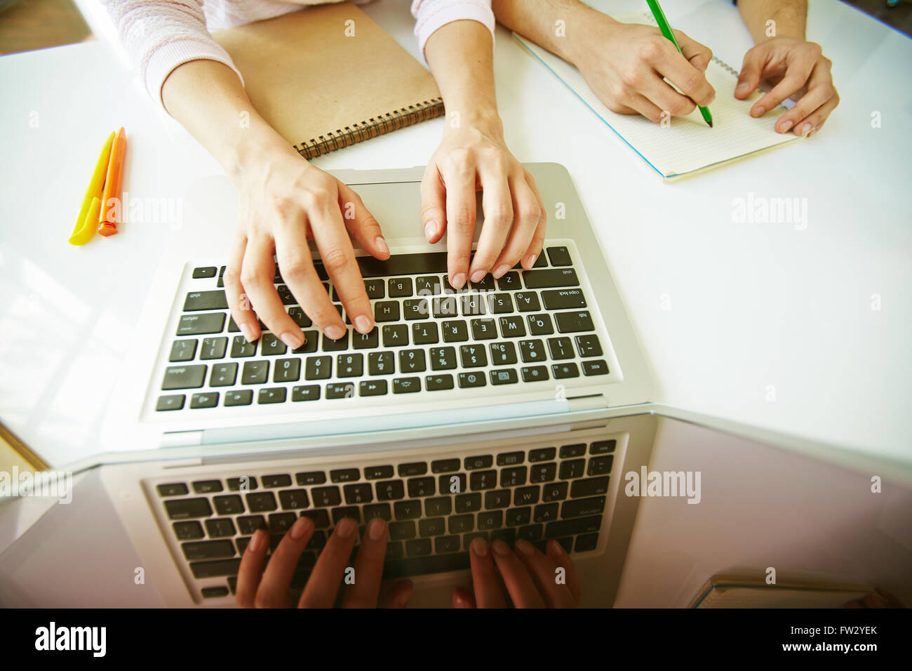 Adult female sitting writing hi-res stock photography and images - Alamy