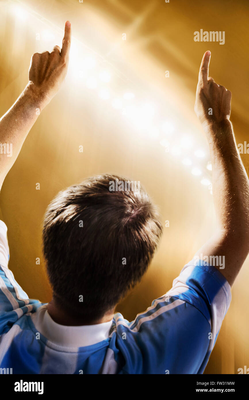 Cheering in stadium Stock Photo - Alamy