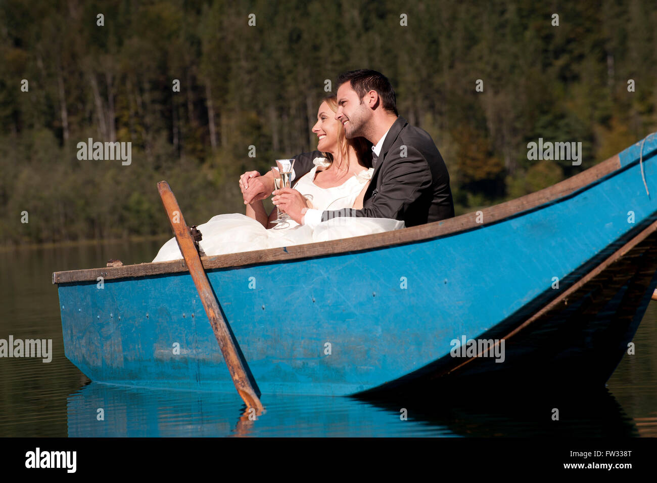 Wedding couple in a rowboat, Almsee, Upper Austria, Salzkammergut ...