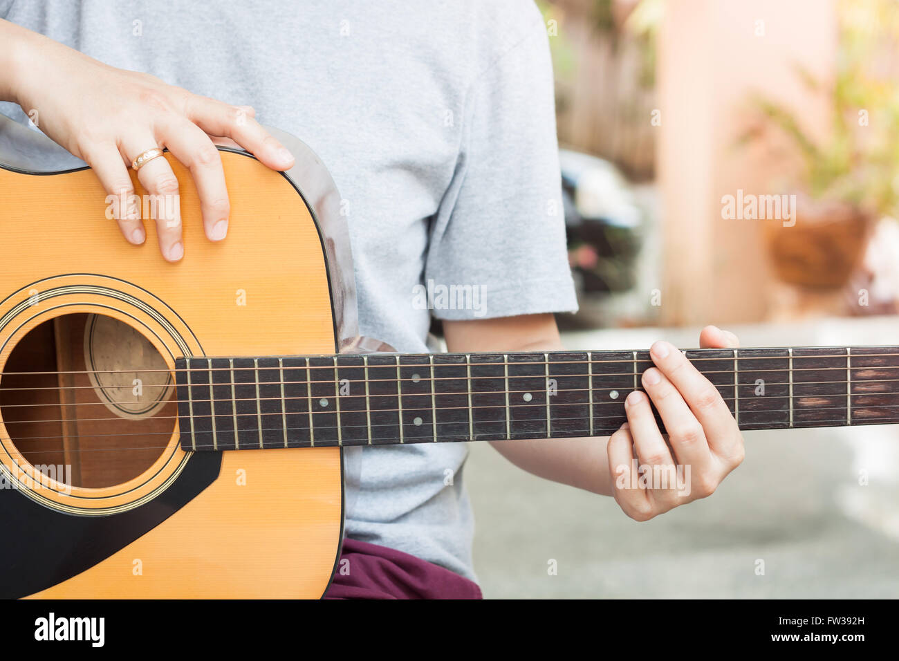 Woman's hands playing acoustic guitar, stock photo Stock Photo - Alamy