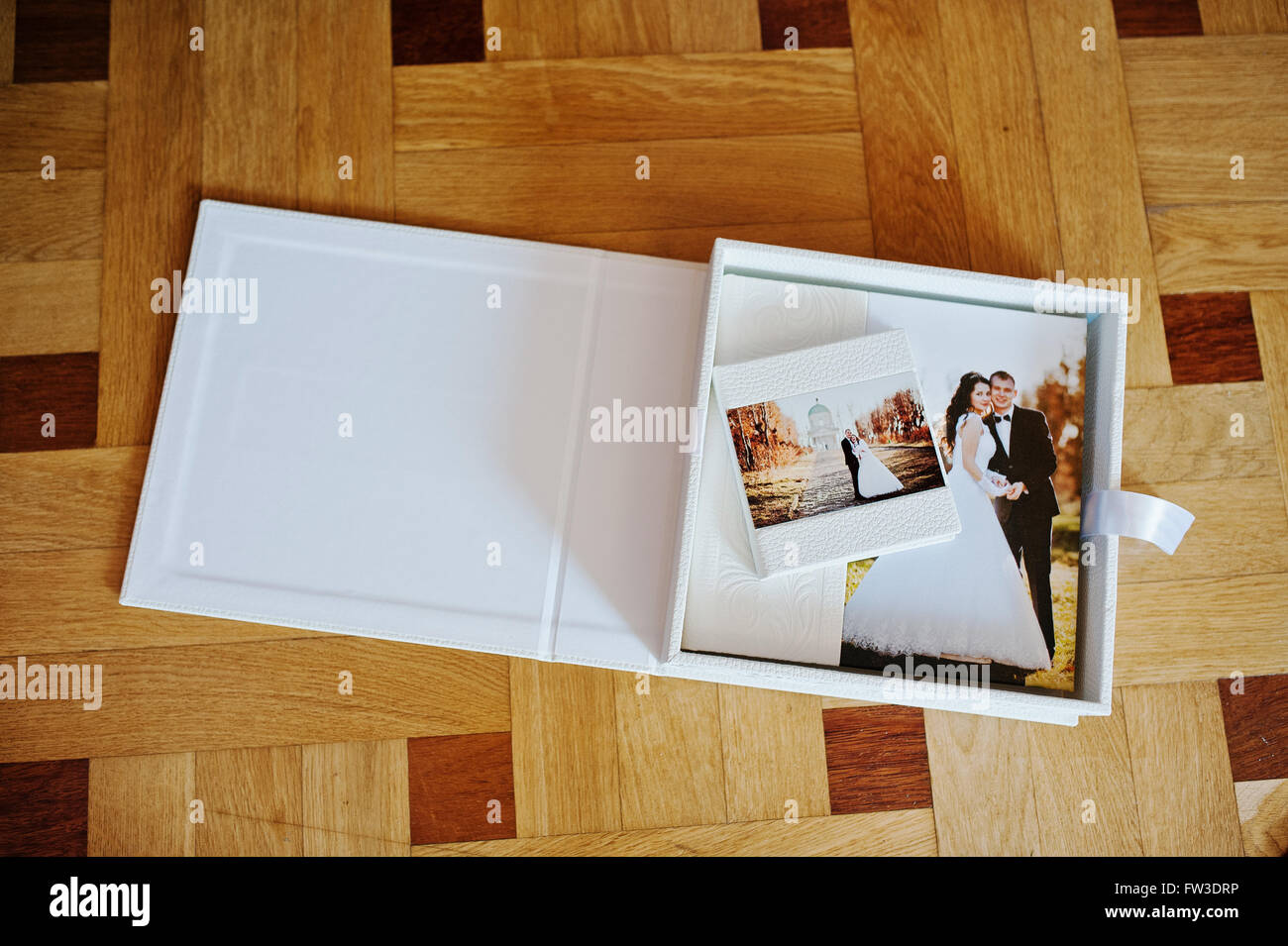 White leather wedding book or wedding album on wooden background Stock ...