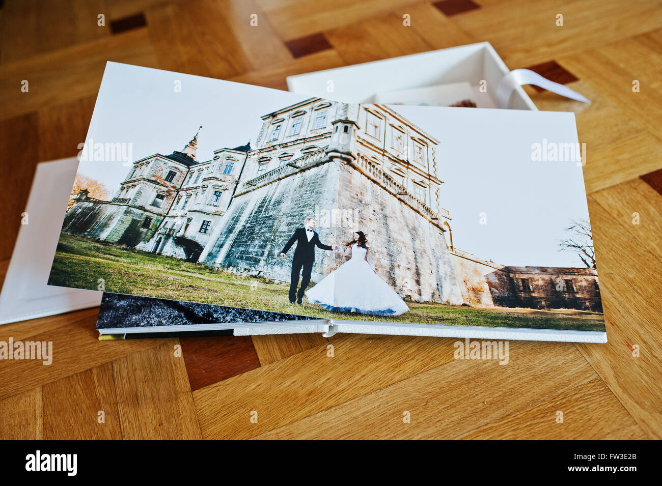 White leather wedding book or wedding album on wooden background Stock ...