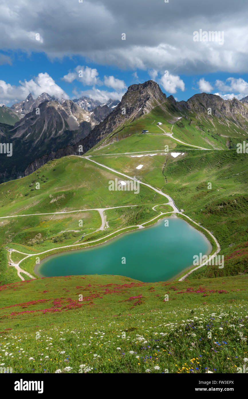 Summer at the lake Riezler Alpsee in the Allgau Alps above of the ...