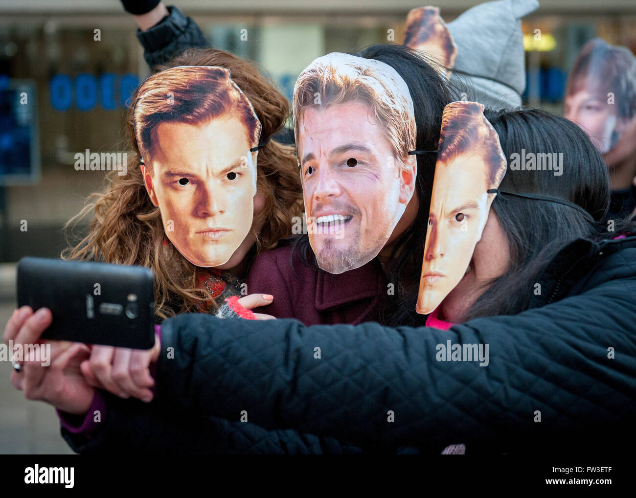 Fans wearing Leonardo DiCaprio masks celebrated the star's Oscar win by ...