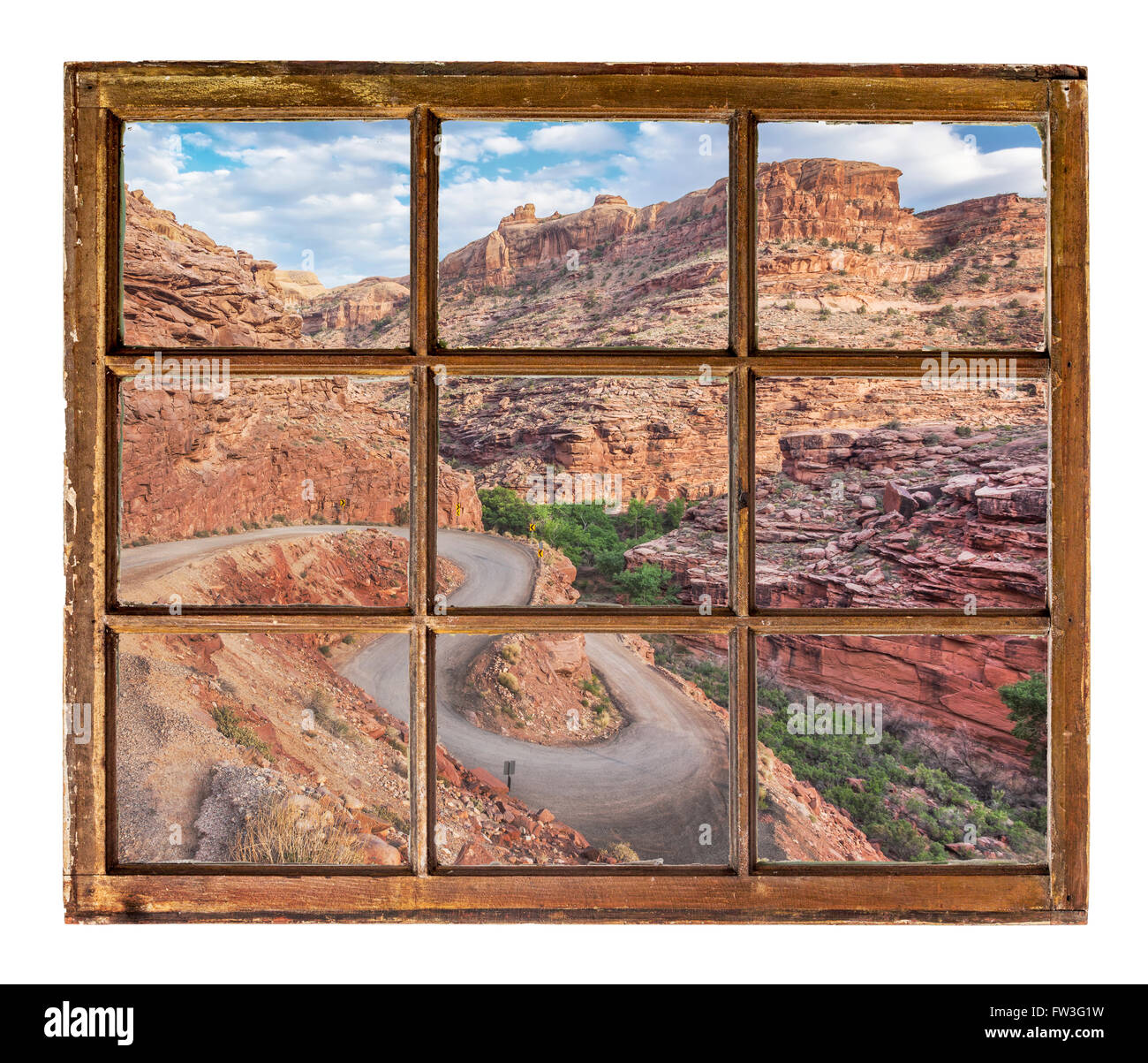 windy canyon road as seen through vintage, grunge, sash window with ...