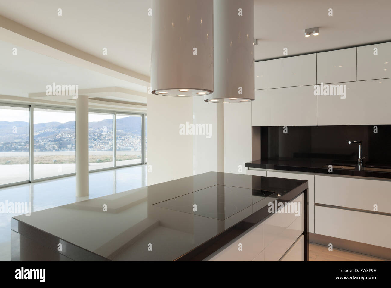 Interior, wide open space, hob of a modern kitchen Stock Photo - Alamy