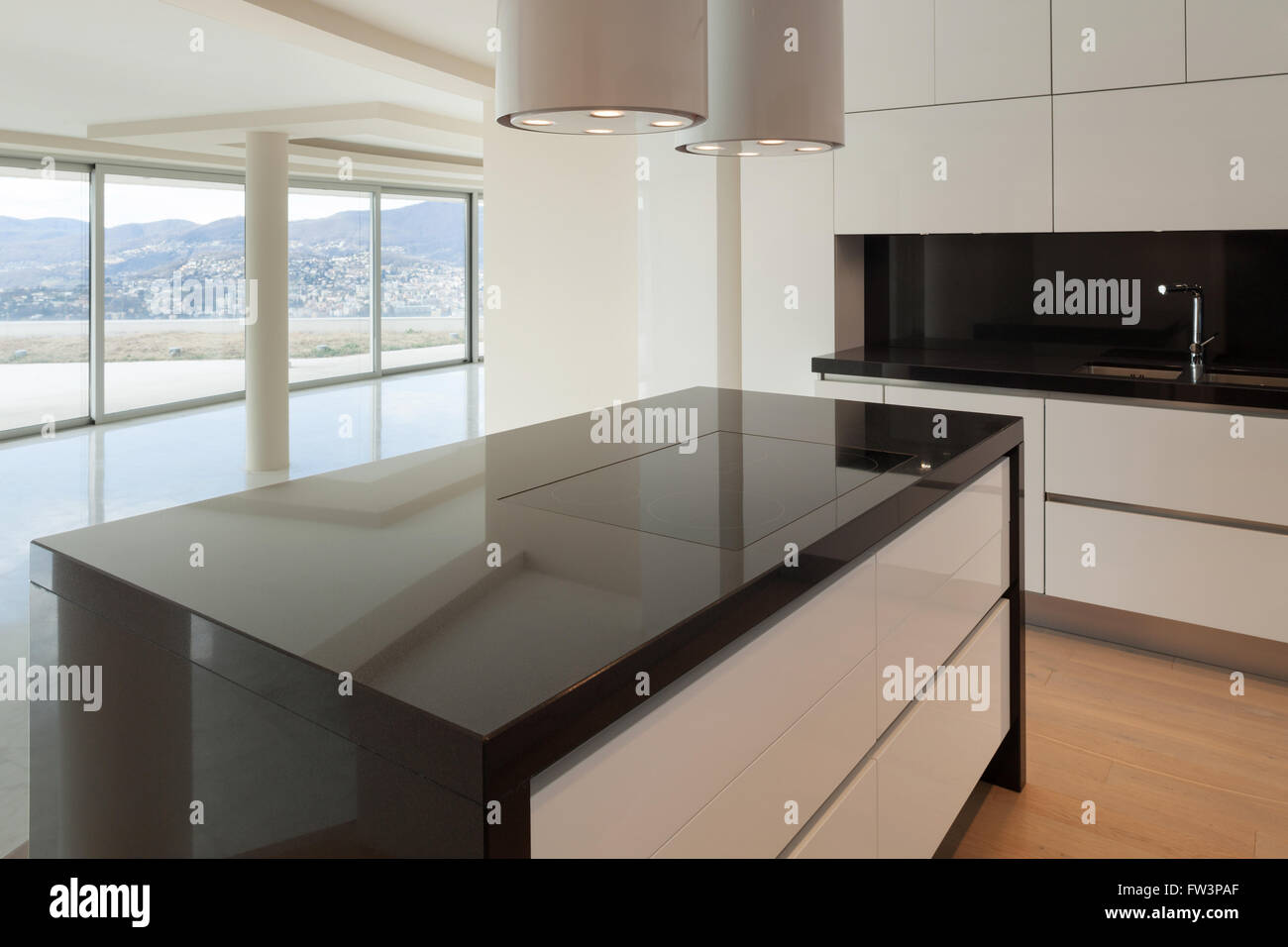 Interior, wide open space, hob of a modern kitchen Stock Photo - Alamy