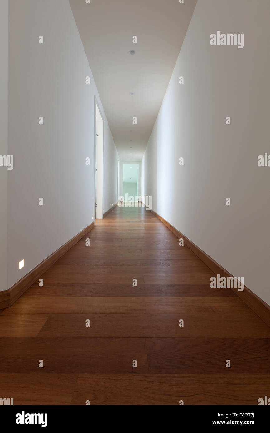 Architecture, long corridor of a modern building, parquet floor Stock ...