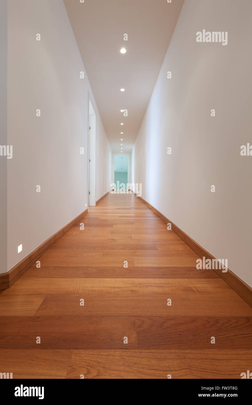 Architecture, long corridor of a modern building, parquet floor Stock ...
