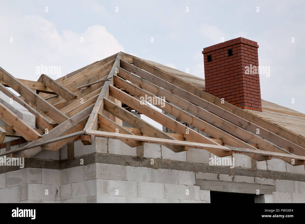 building of a roof in some new house Stock Photo - Alamy