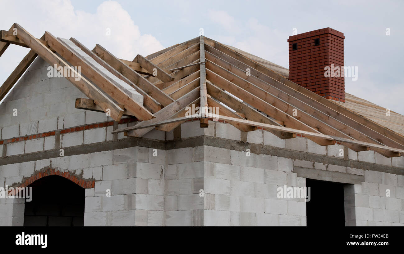 building of a roof in some new house Stock Photo - Alamy