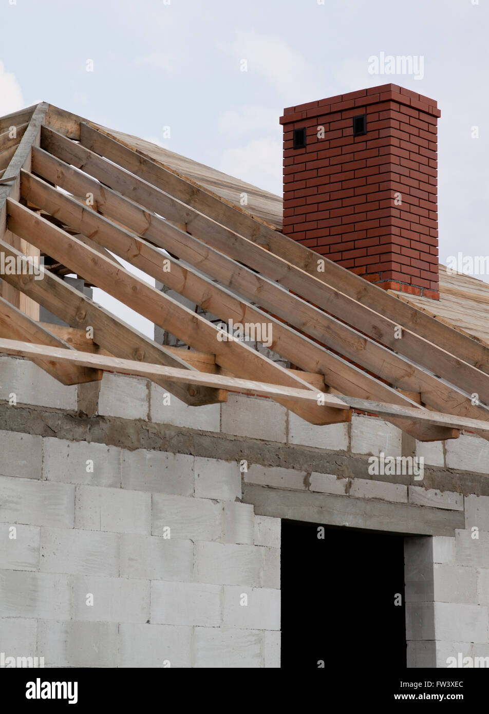 building of a roof in some new house Stock Photo - Alamy
