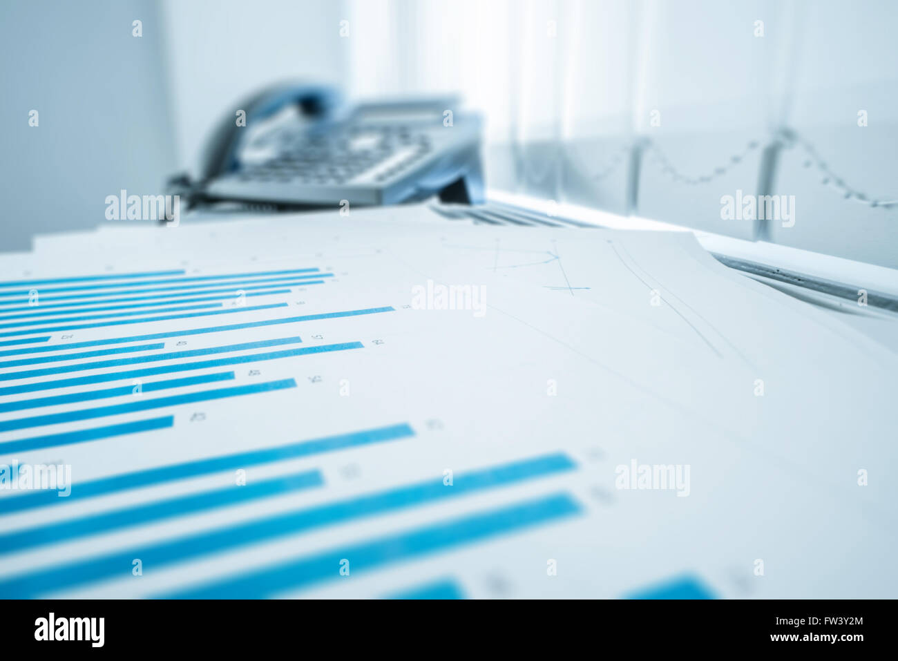 Office documents on a desk with a telephone Stock Photo - Alamy