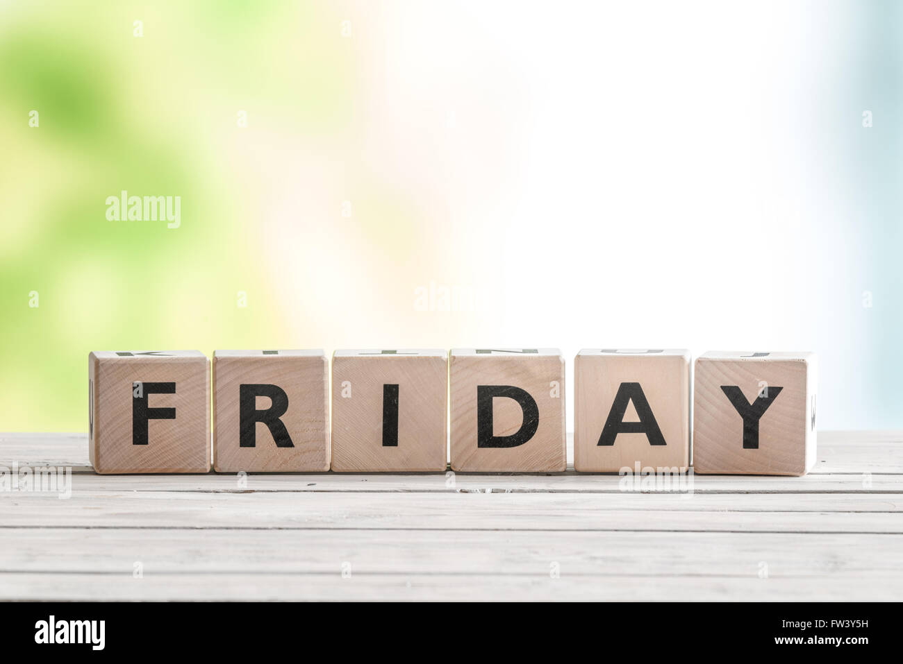 Friday sign with wooden cubes on a table Stock Photo - Alamy
