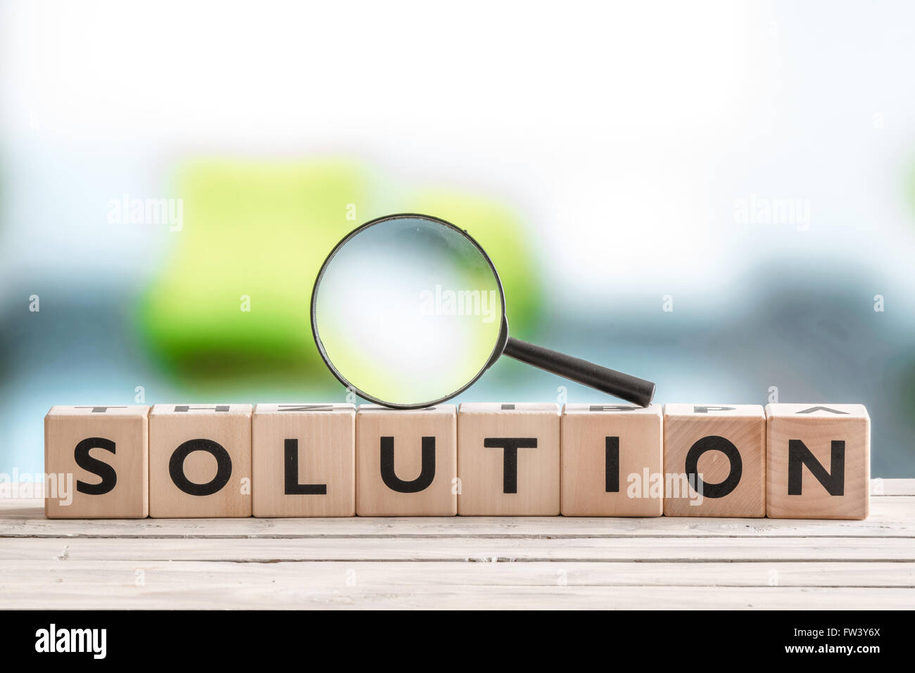 Solution search sign with wooden cubes on a table Stock Photo - Alamy