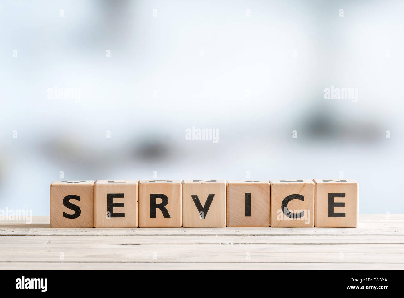 Service sign on a wood table in an office Stock Photo - Alamy