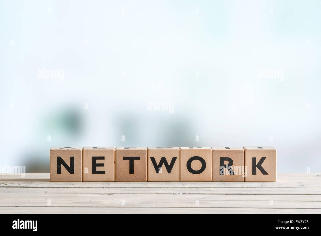 Network sign on a wooden desk in an office Stock Photo - Alamy