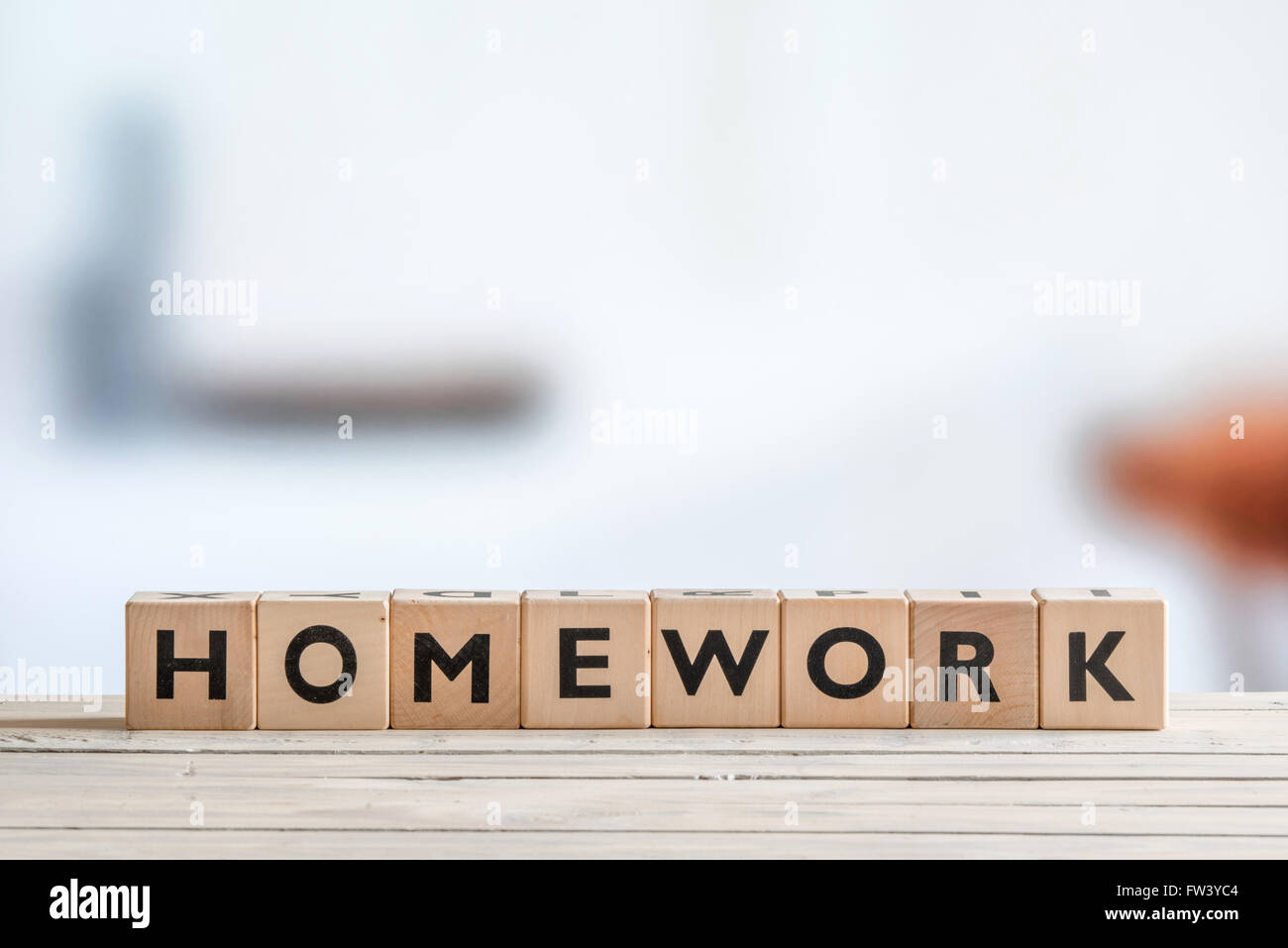 Homework message on an indoor table Stock Photo - Alamy