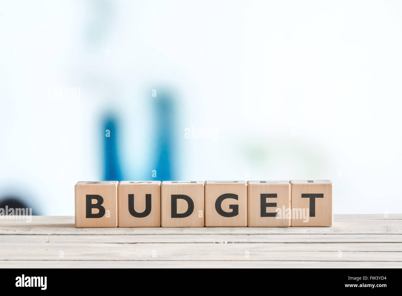 Budget sign on a wooden table with blocks Stock Photo - Alamy