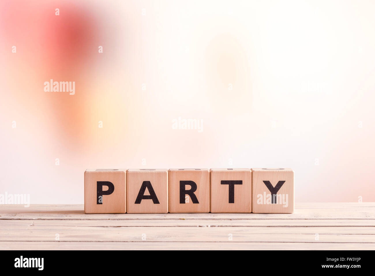 Party sign made of wood on an indoor table Stock Photo - Alamy