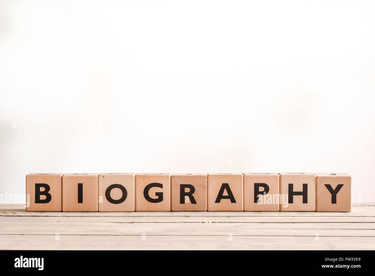 Biography headline sign made of wood on a table Stock Photo - Alamy